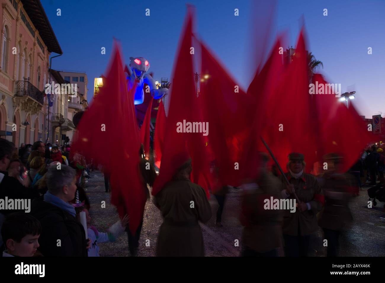 VIAREGGIO,ITALY-FEB.15 2020: masked persons parade in the street of ...