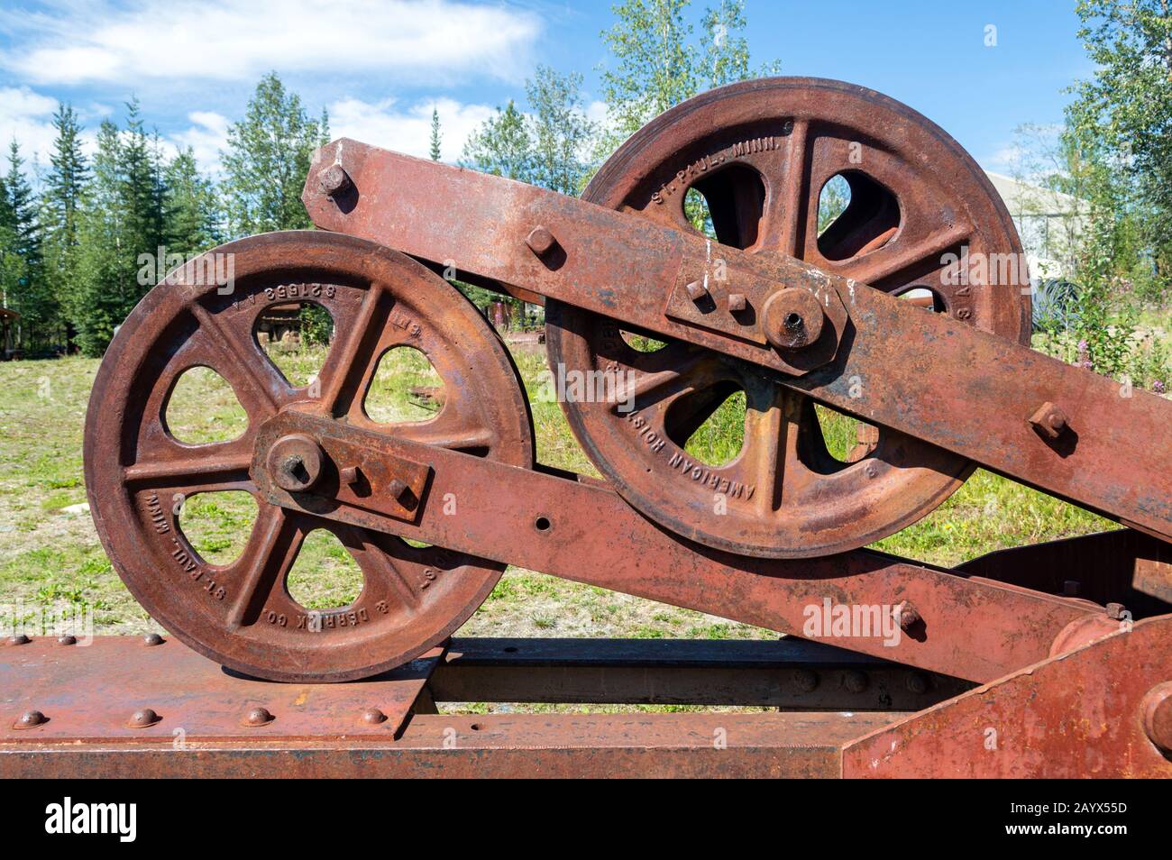Chicken, Alaska, USA - July 24, 2015: Rusty pulleys at a display of old ...