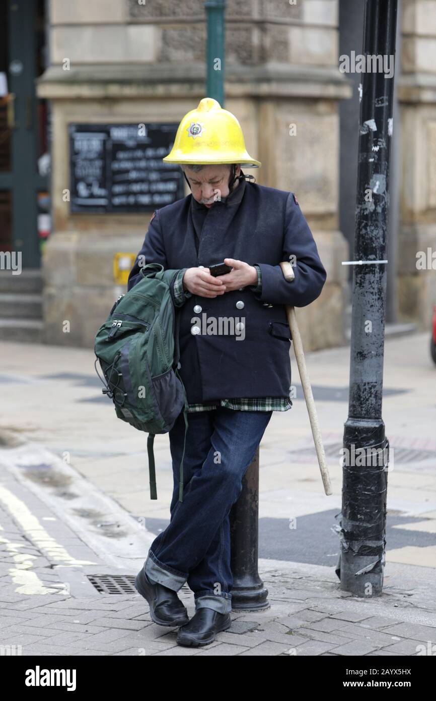 York, UK. A man dressed as a fire officer in York Stock Photo - Alamy