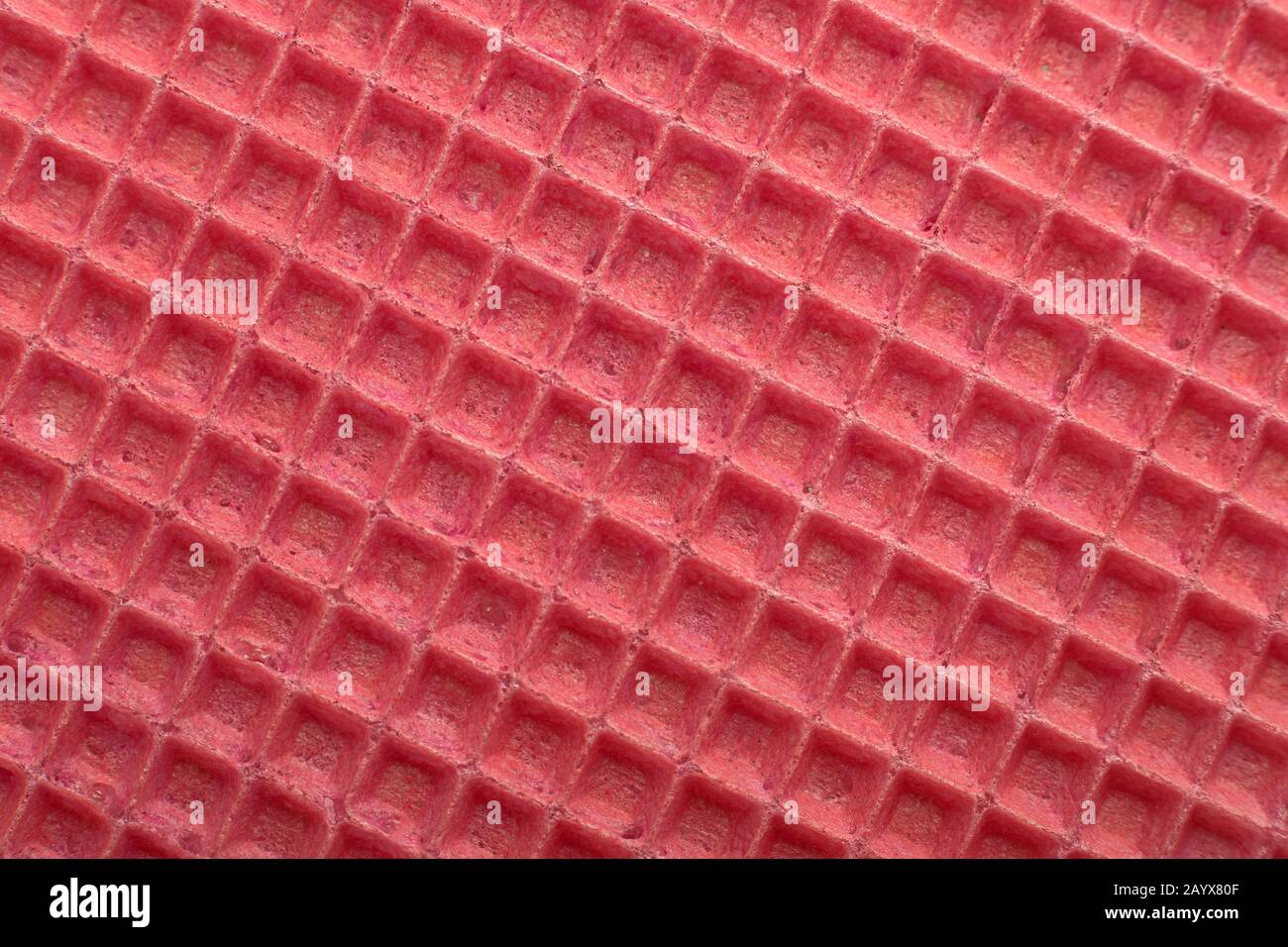 Red waffles surface closeup detail background Stock Photo - Alamy