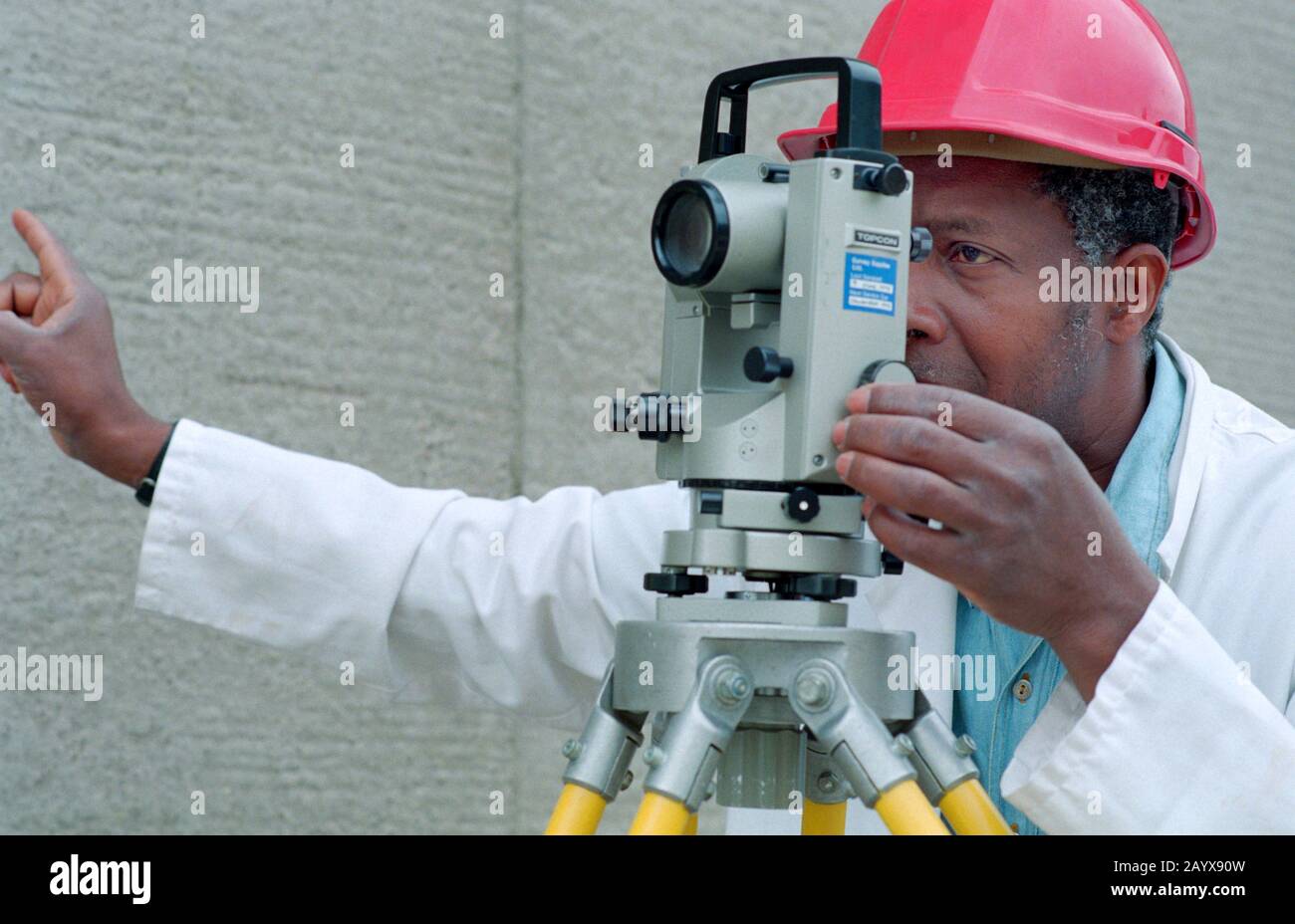 Surveyor using a theodolite Stock Photo - Alamy