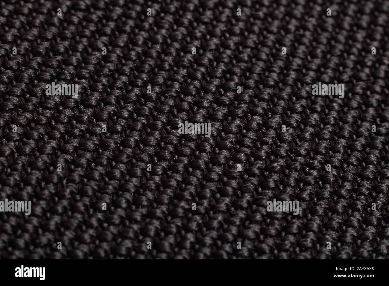 Black knitted fabric closeup, background and texture Stock Photo - Alamy