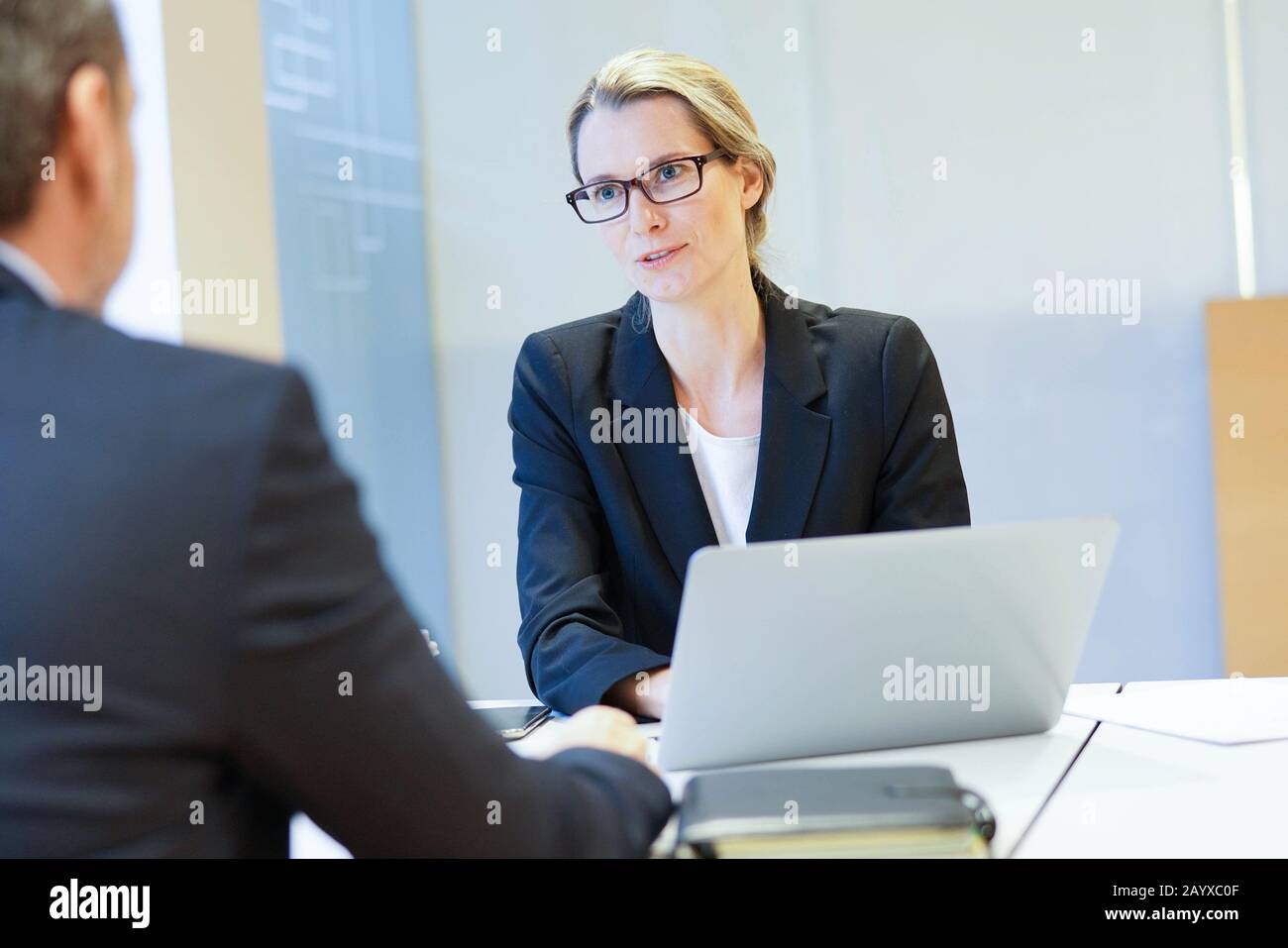 Executive man having an interview for job position Stock Photo - Alamy