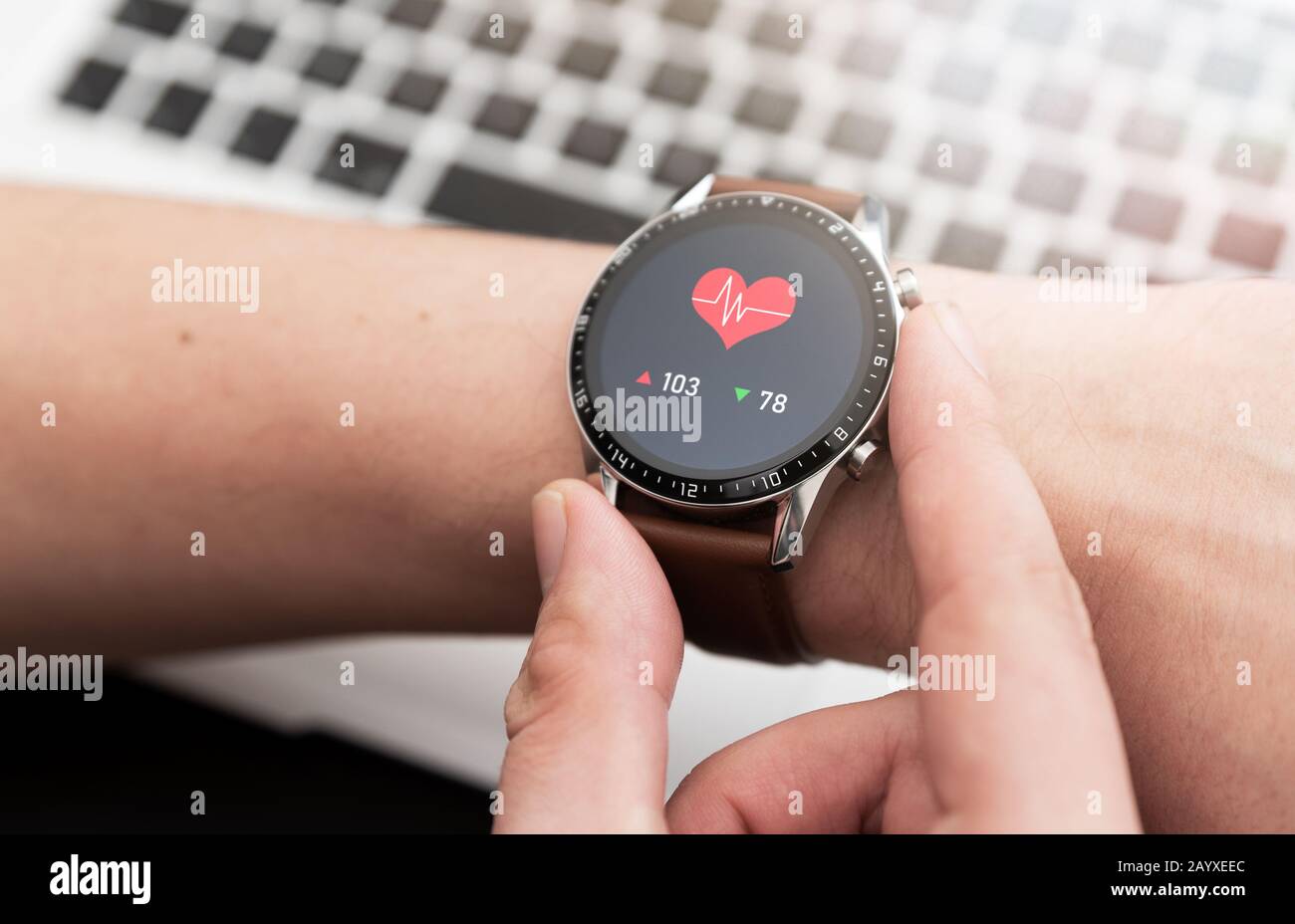 Hands with heart icon on smartwatch. Heart rate measurement Stock Photo ...