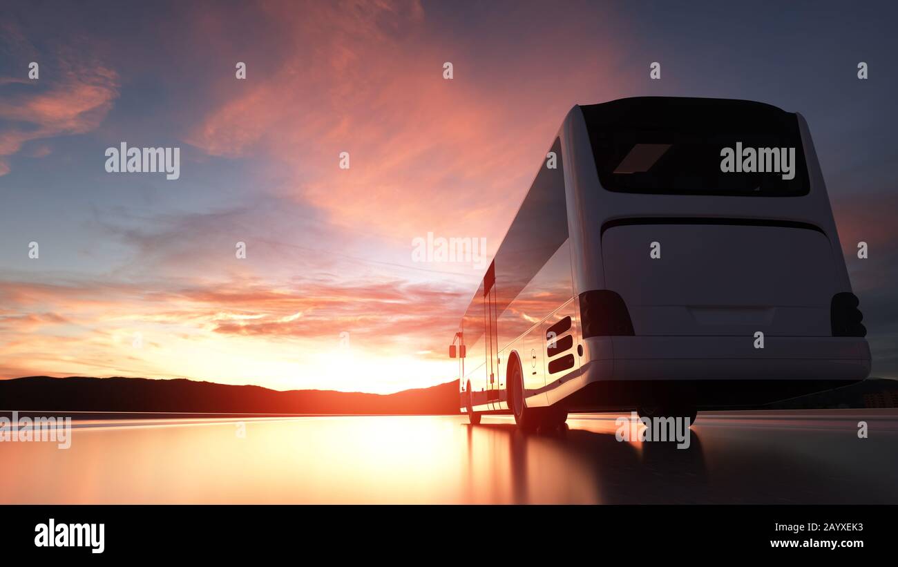 Tourist bus driving on a highway at sunset backlit by a bright orange ...