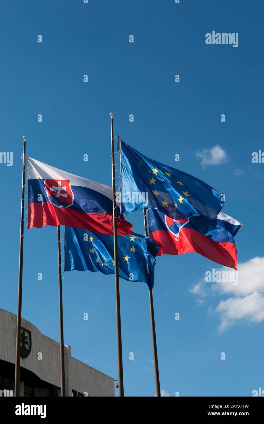 National flags in front of the parliament building in bratislava hi-res ...
