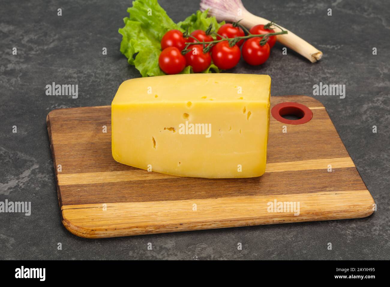 Swiss Hard yellow tasty cheese brick Stock Photo - Alamy