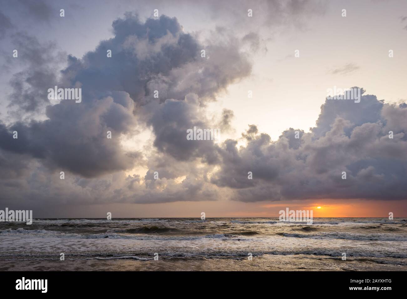 Summer storm clouds over the ocean and beach hi-res stock photography ...