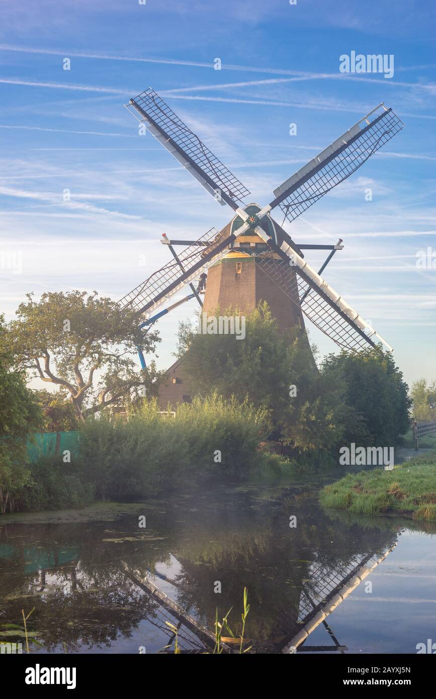 Windmill and tree hi-res stock photography and images - Alamy