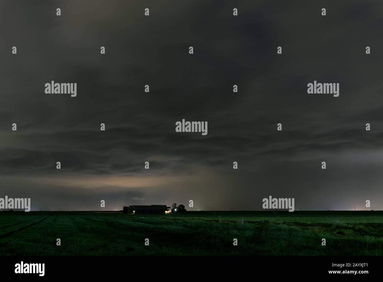 Dark threatening storm clouds over a farm Stock Photo - Alamy