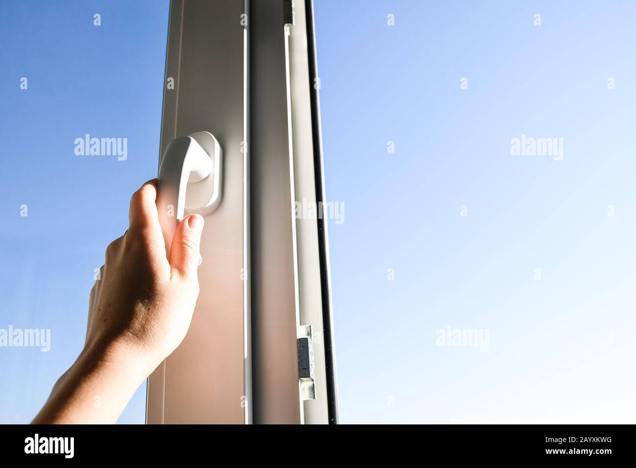 hand opening plastic vinyl window Stock Photo - Alamy