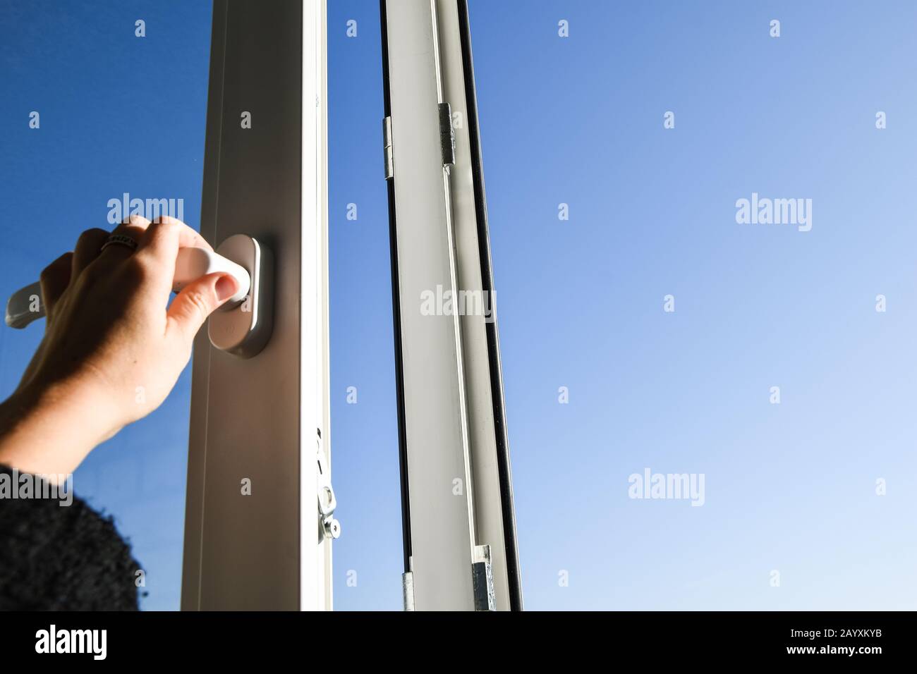 hand opening plastic vinyl window Stock Photo - Alamy