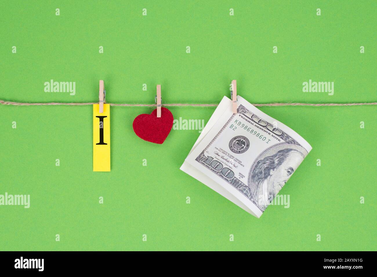 Love over money hi-res stock photography and images - Alamy