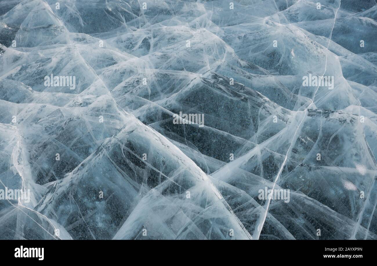 Patterns on light blue ice look like dragonfly wings Stock Photo - Alamy