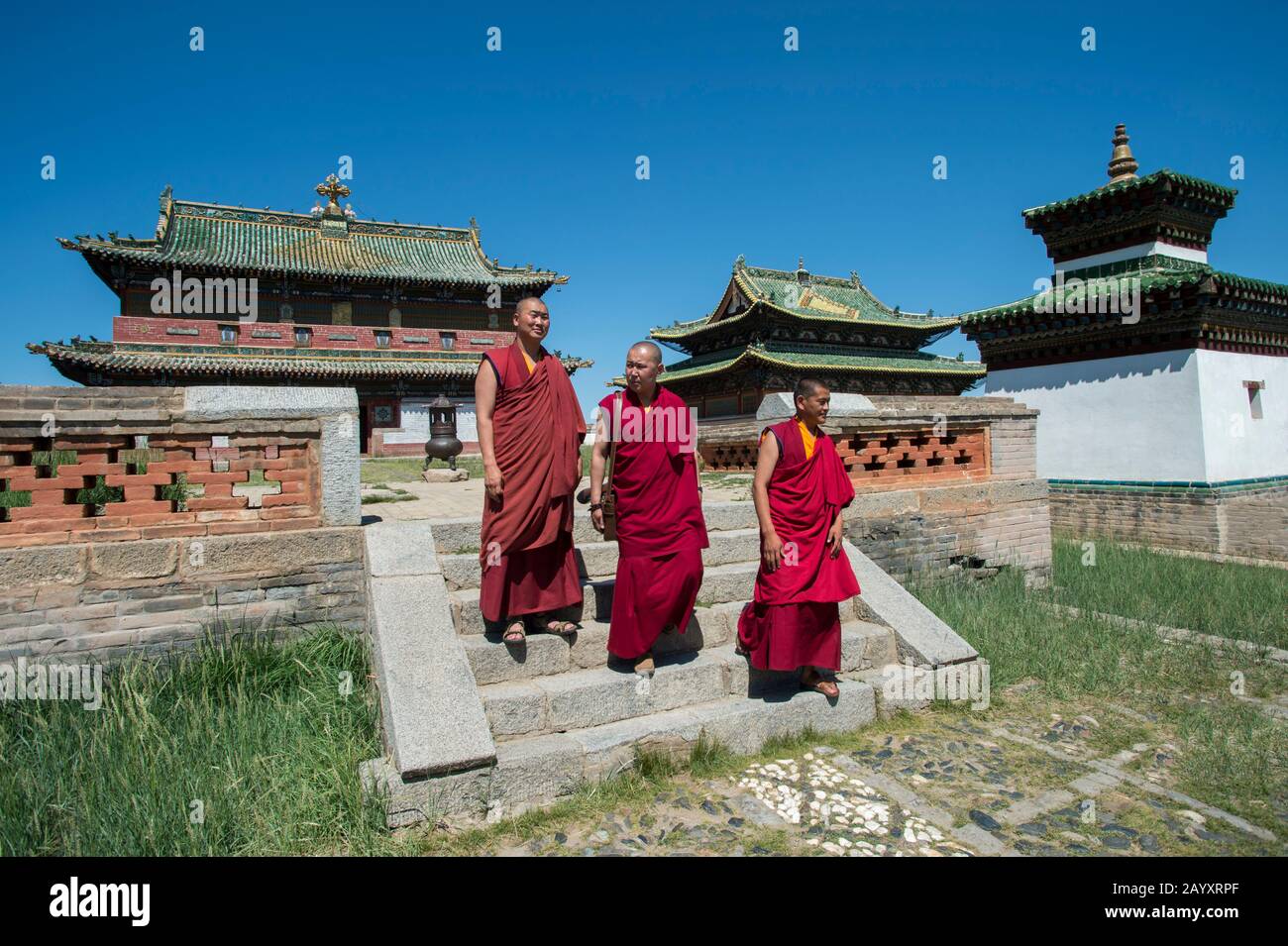 Mongolian monks on steps in front of the Zuu temples, part of the ...