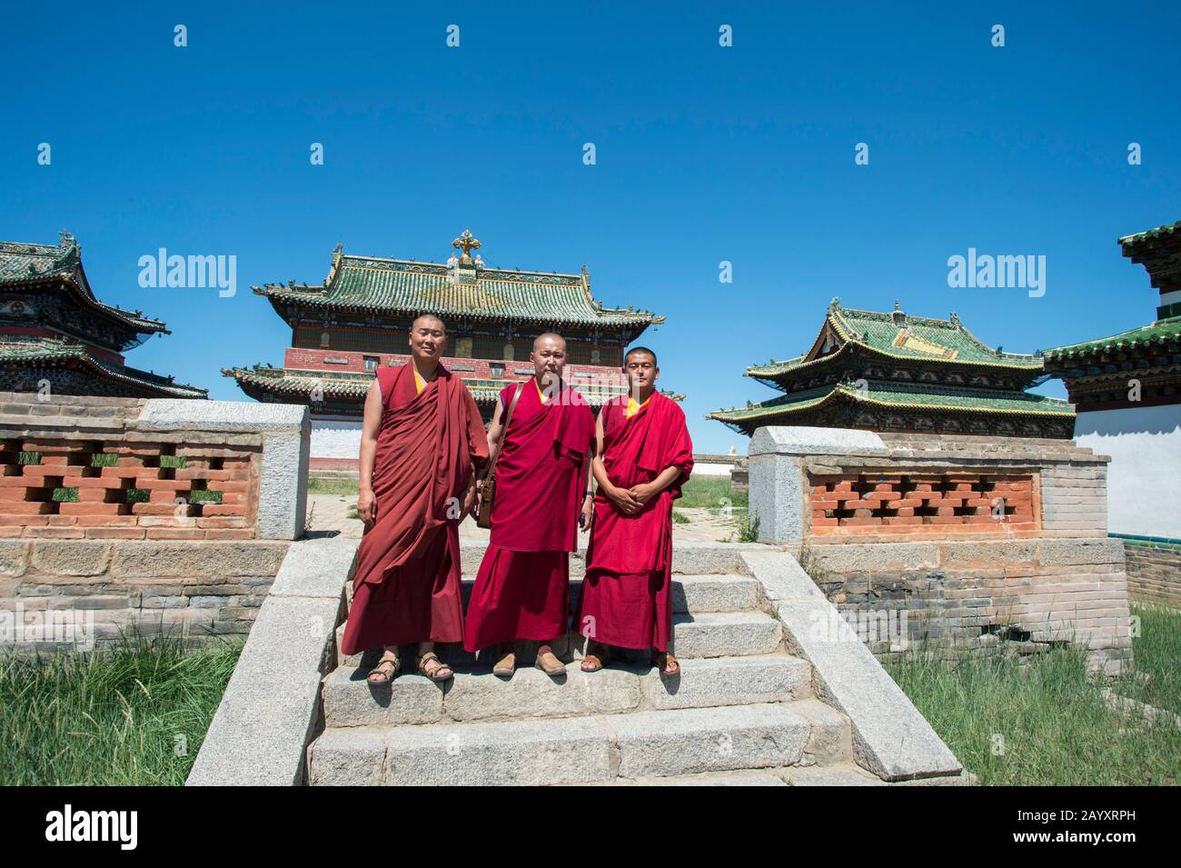 Mongolian monks on steps in front of the Zuu temples, part of the ...