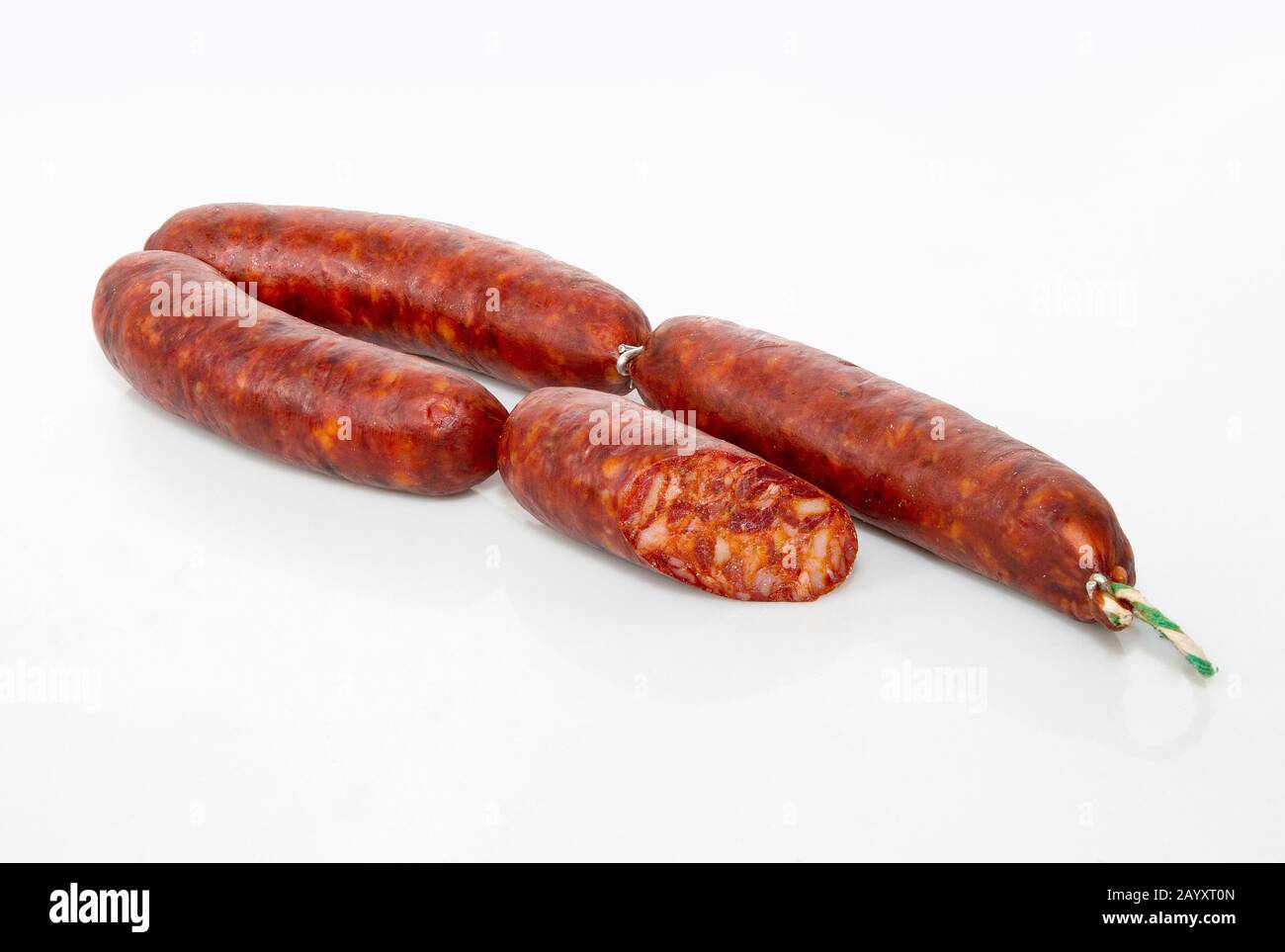 Iberian chorizo isolated on white background Stock Photo - Alamy