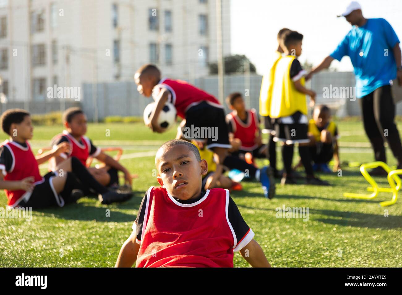 Soccer player tired after a match Stock Photo - Alamy