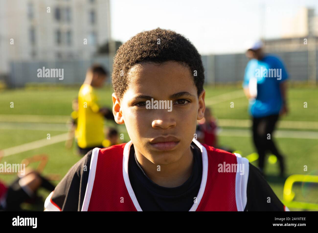 Front view soccer player looking at the camera Stock Photo - Alamy