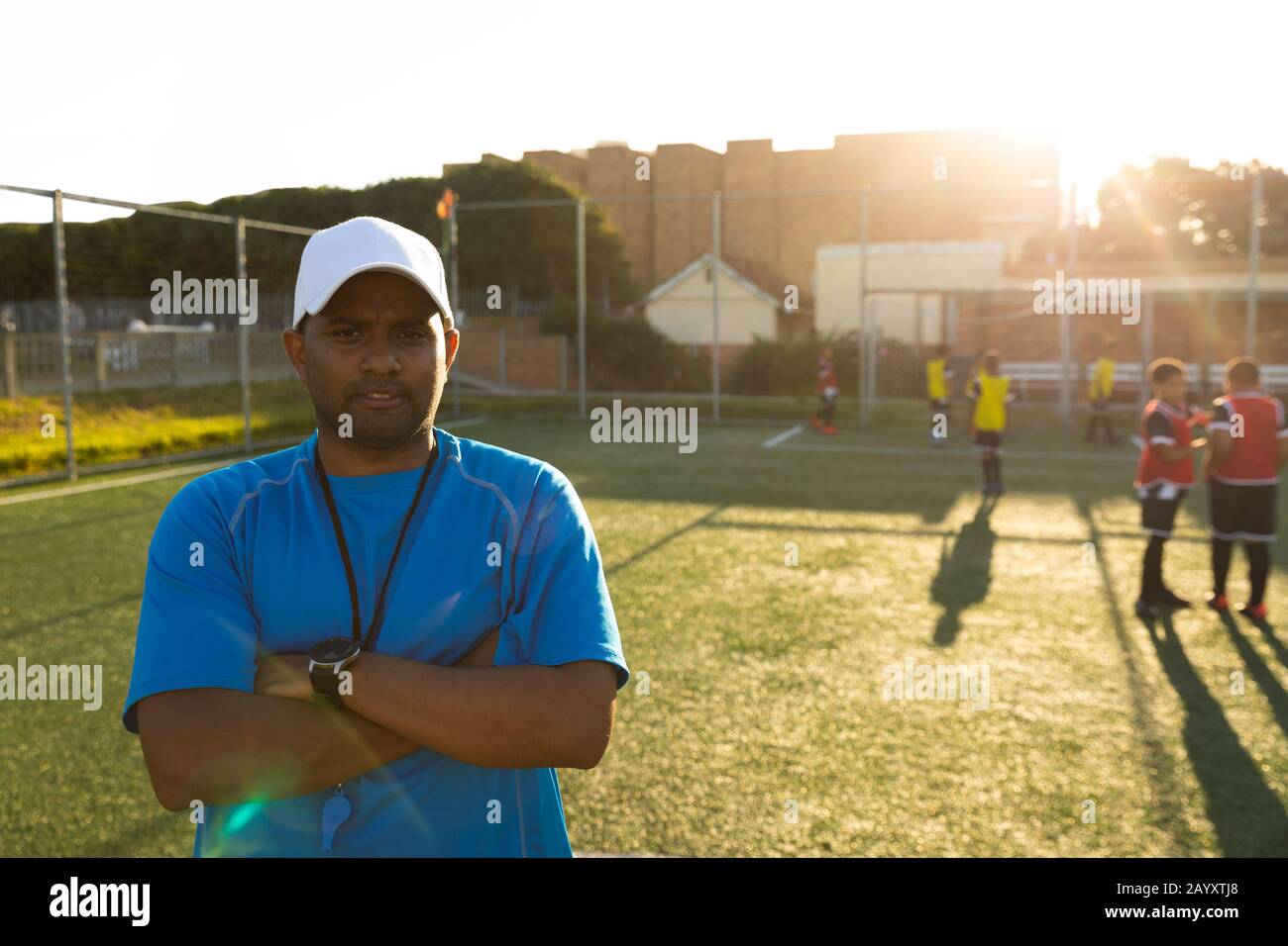 Soccer coach looking at the camera Stock Photo - Alamy