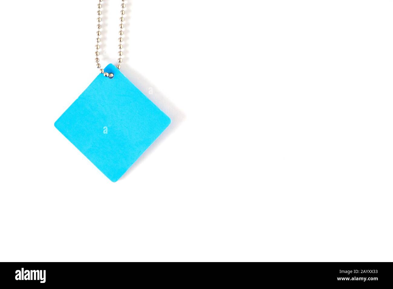 Blue tag on a white background Stock Photo - Alamy