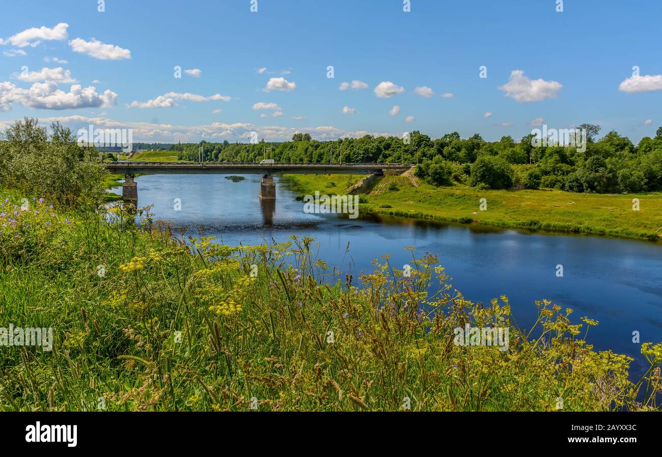 A sunny July day in a park on the banks of the Luga River in Kingisepp ...