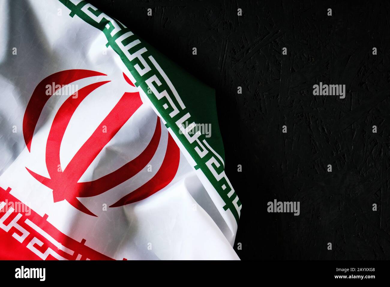 National flag of Iran on a dark background with space for text Stock ...