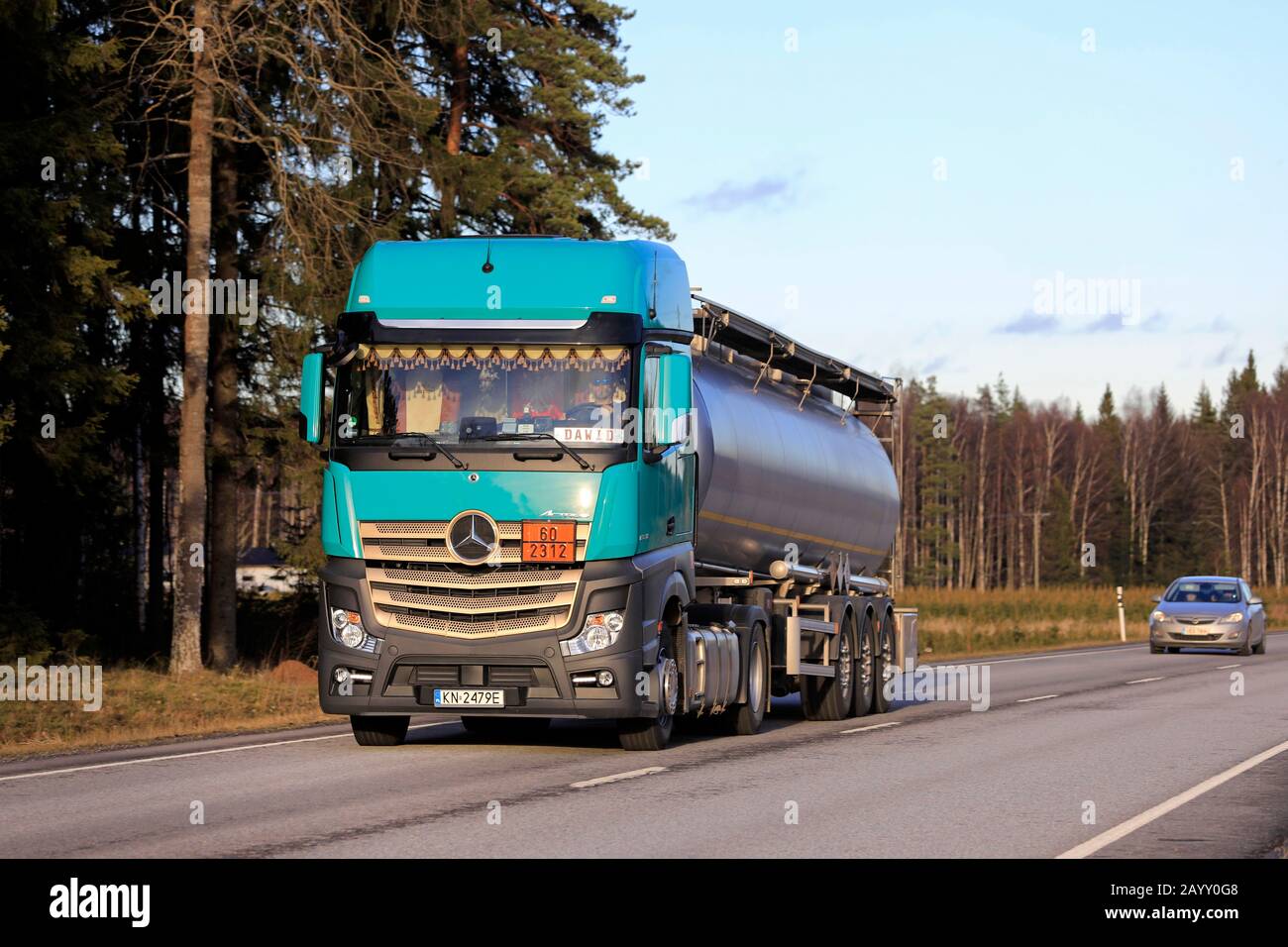 Turquoise Mercedes-Benz Actros semi tanker hauls flammable goods on ...