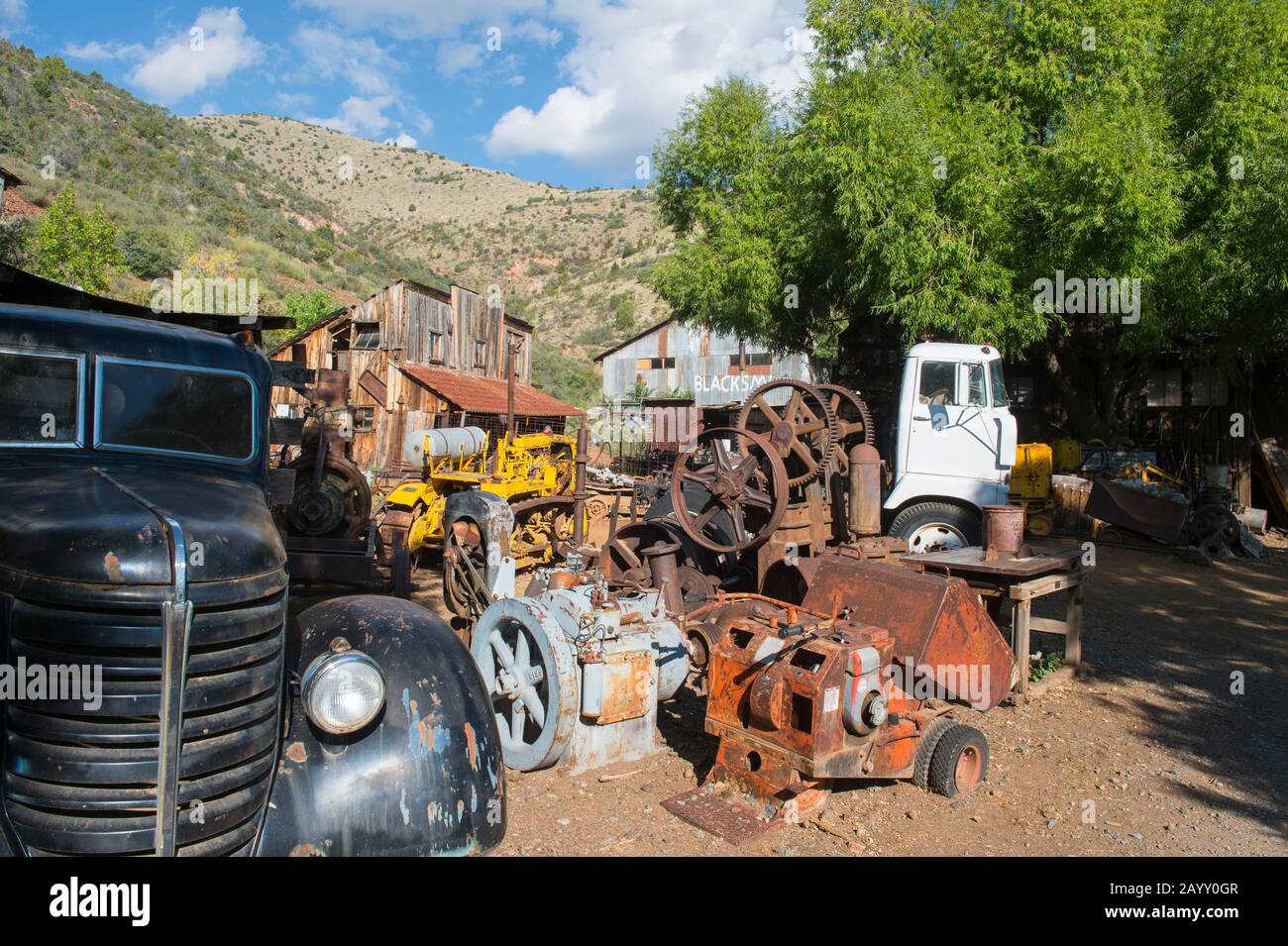 Old mining equipment, cars and trucks at the historic Gold King Mine ...