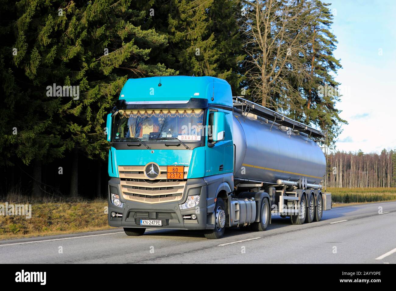 Turquoise Mercedes-Benz Actros semi tanker hauls flammable goods on ...