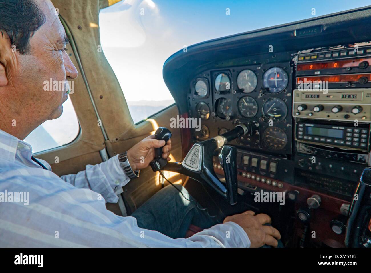 Oaxaca, Mexico - Captain Juan Carlos Vega flies a Cessna 172 between ...