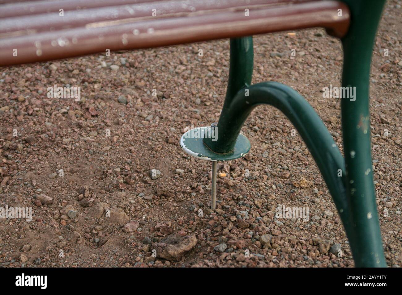 Park bench floating above ground with the earth underneath being eroded ...
