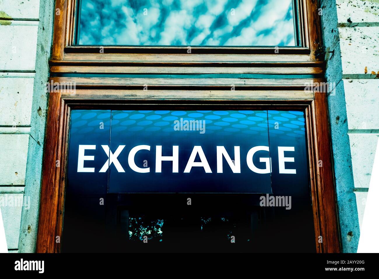 Door with the word Exchange over a business office Stock Photo - Alamy