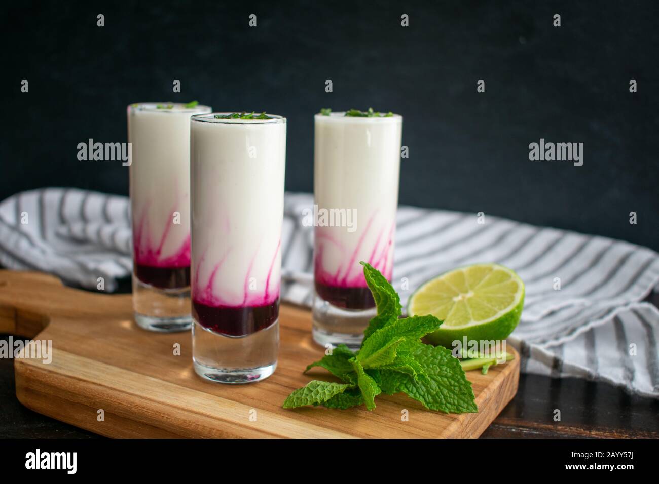 Coconut Lime Mojito Shooters with Blueberry: Three coconut lime mojito ...