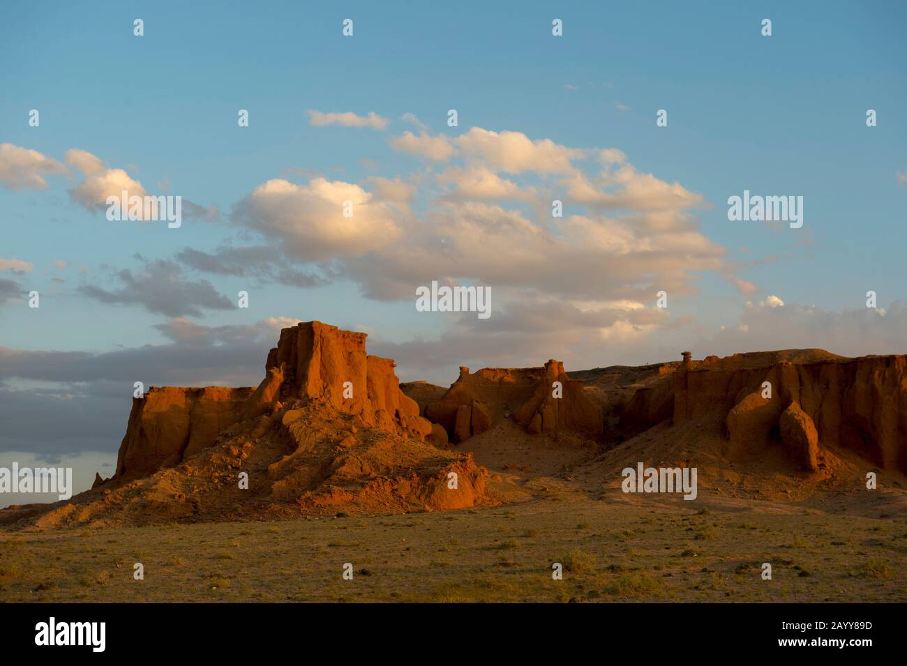 Evening sunshine on the orange rocks of Bayan Zag, commonly known as ...