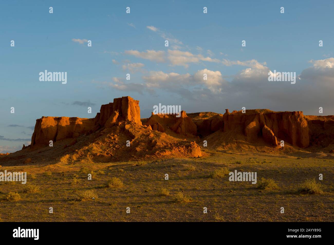 Evening sunshine on the orange rocks of Bayan Zag, commonly known as ...