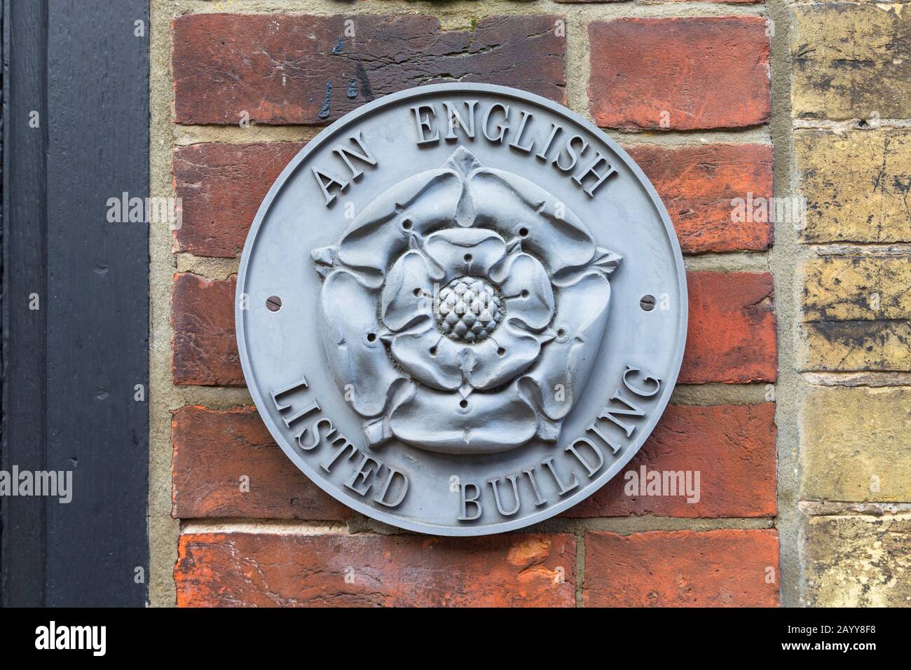 An english listed building plaque, uk Stock Photo - Alamy
