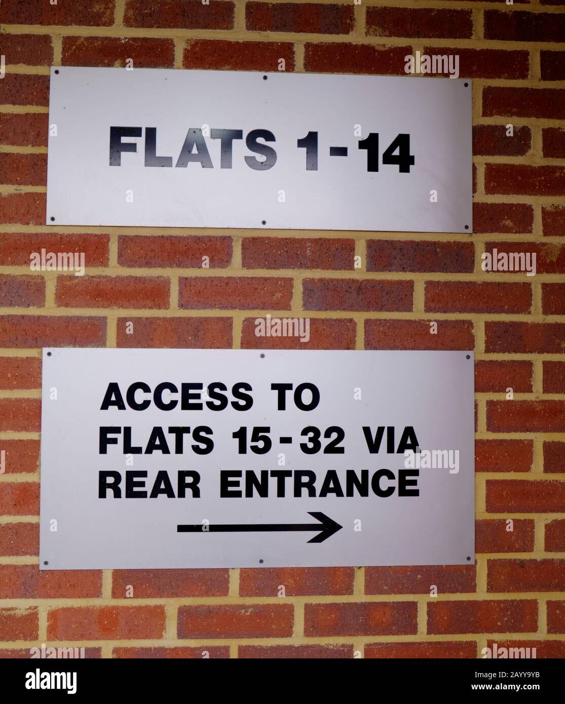 Signage outside apartment block indicating location of apartment by ...