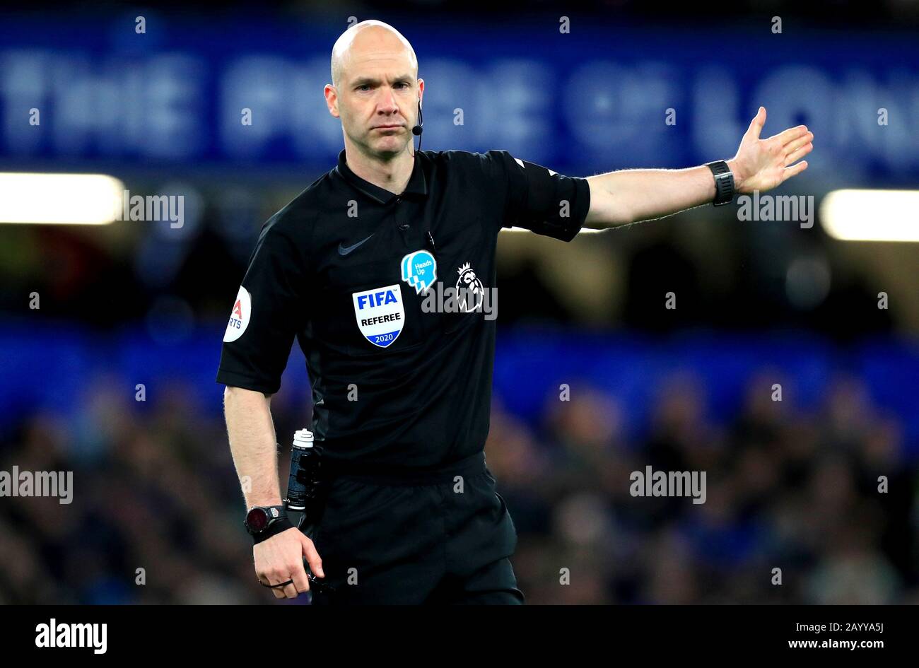 Referee Anthony Taylor gestures on the pitch during the Premier League ...