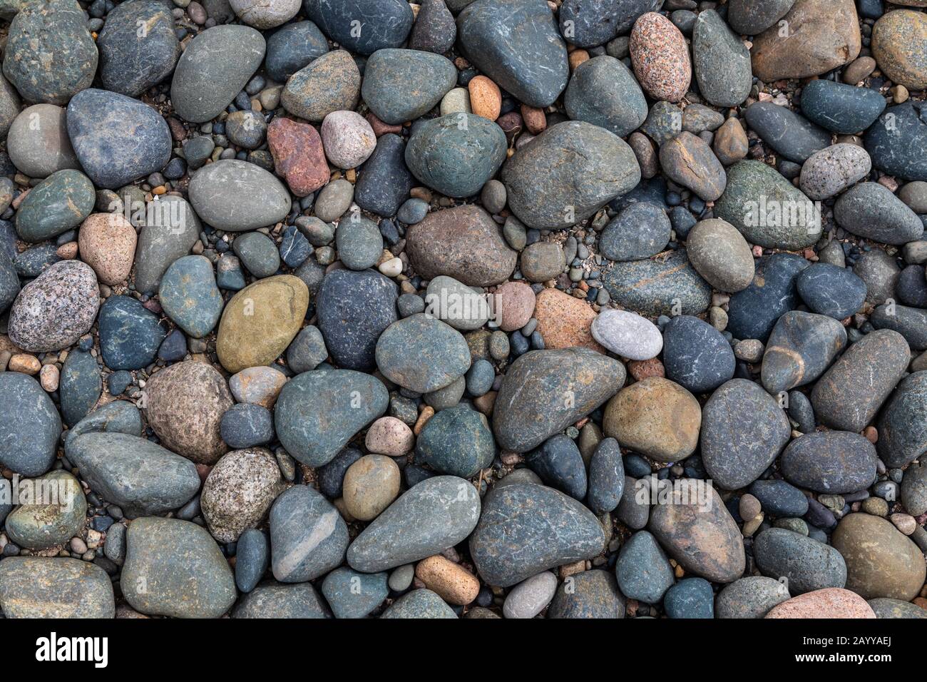 Various sizes and colours of pebbles hi-res stock photography and ...