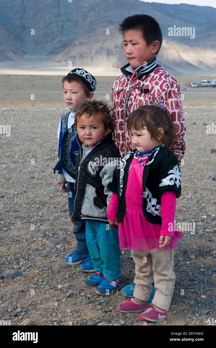 A group of Kazakh children posing for a photographer at the Golden ...
