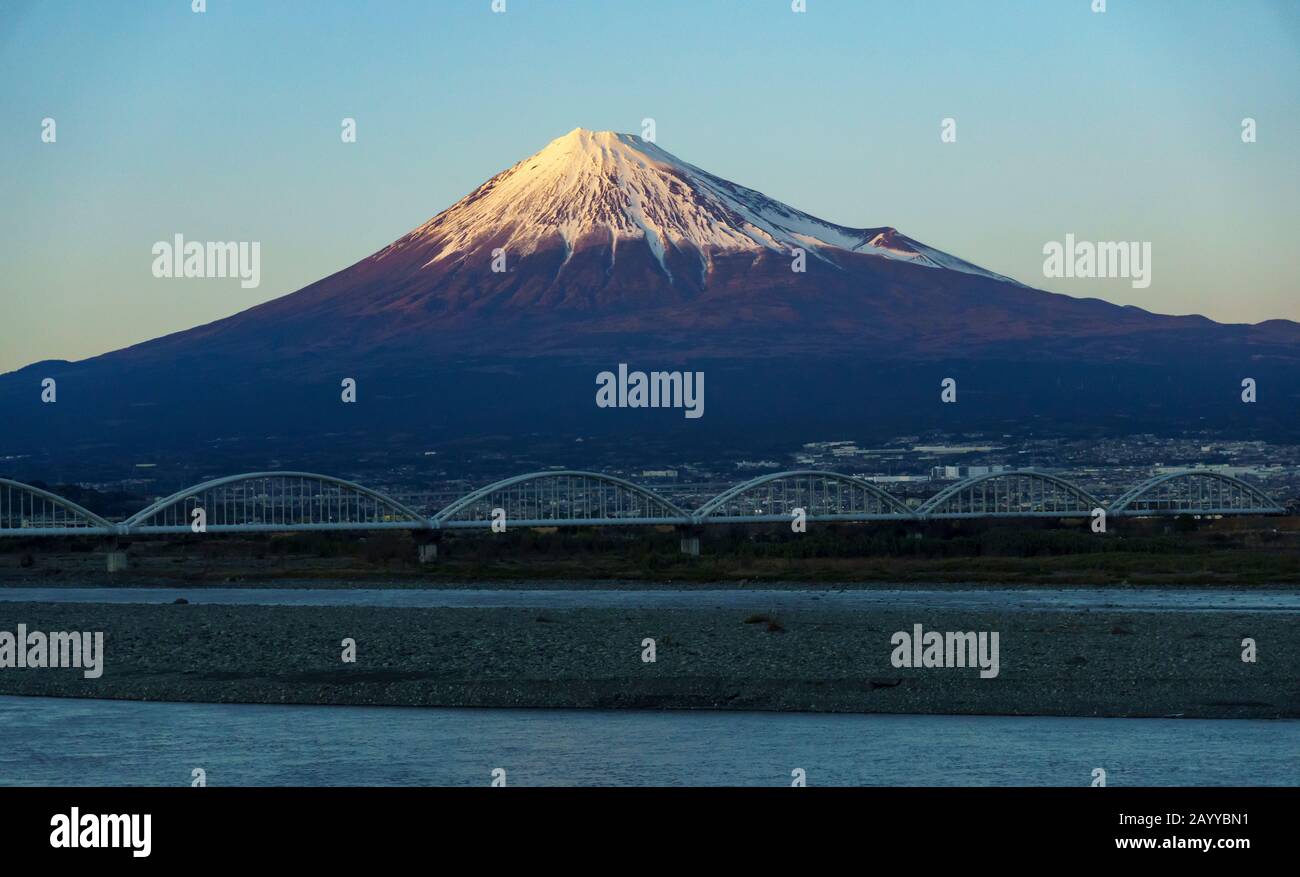 Mount Fuji and the Fuji River (Fujikawa) from a Tokaido Shinkansen train in Shizuoka Prefecture ...