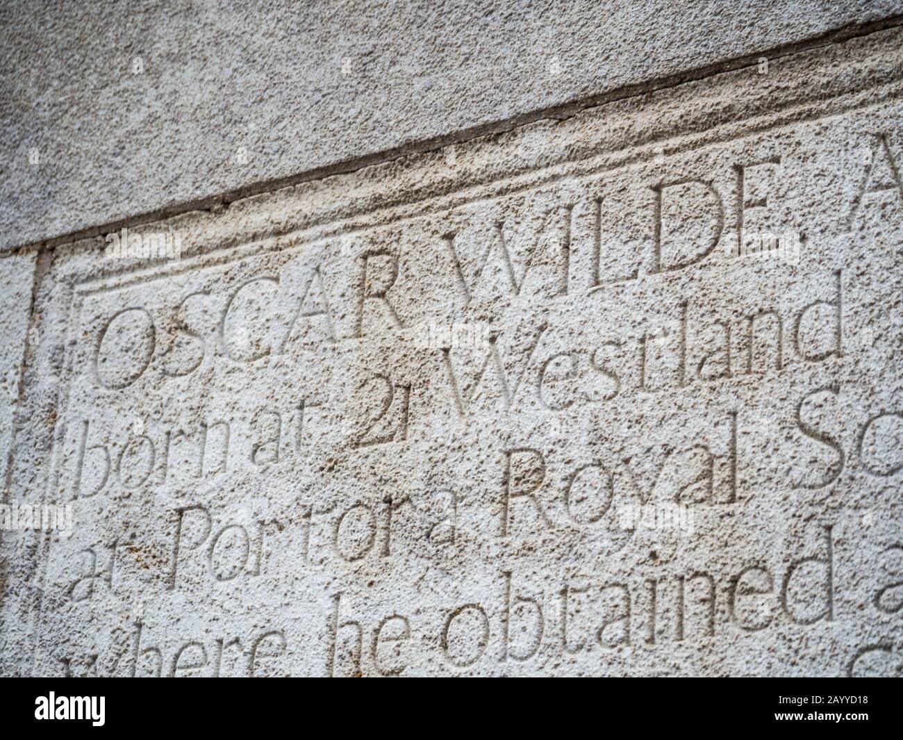 Oscar Wilde engraving tombstone carved in white stone on the side of ...