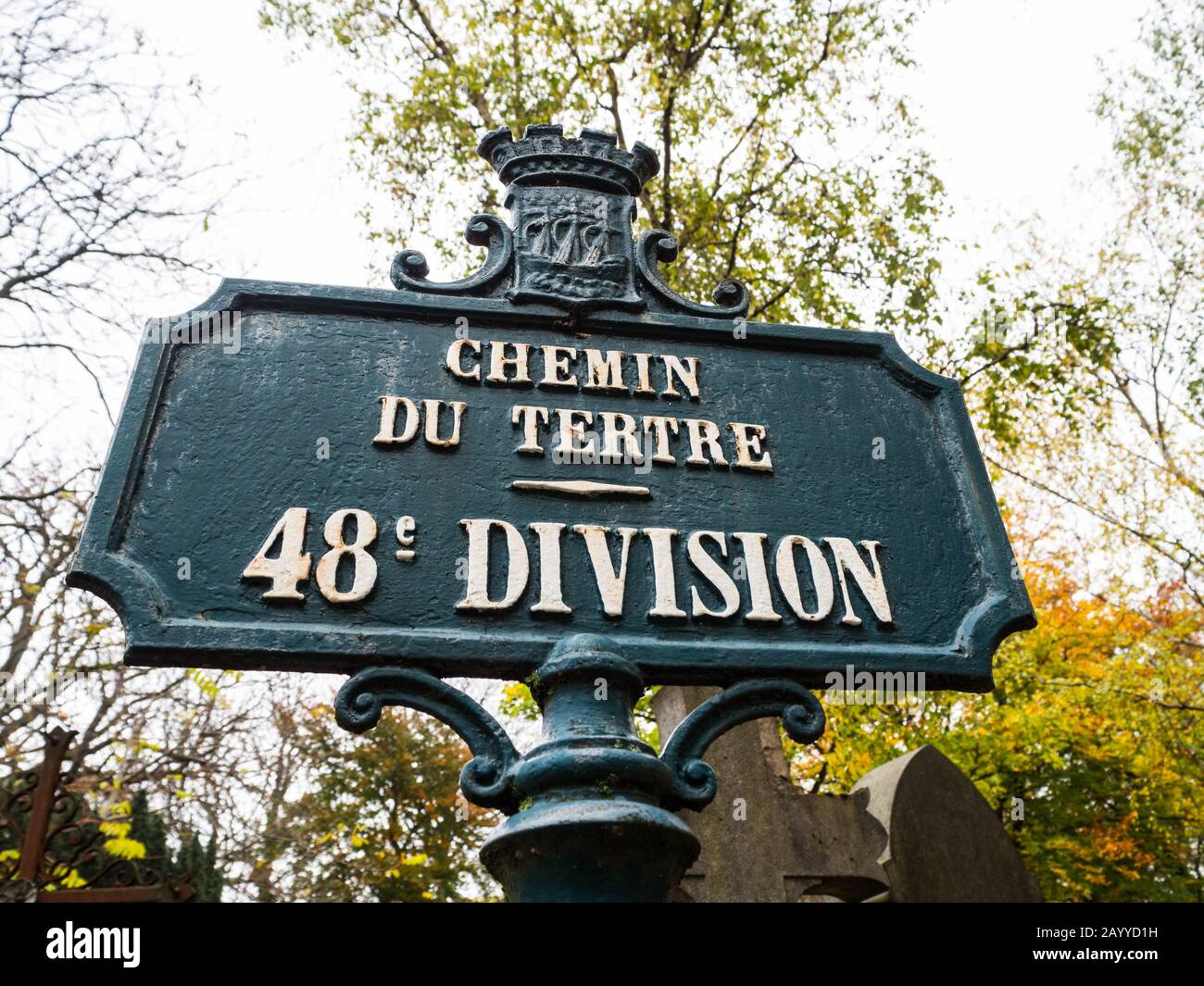 Old green signal with name of the boulevards written in French with ...