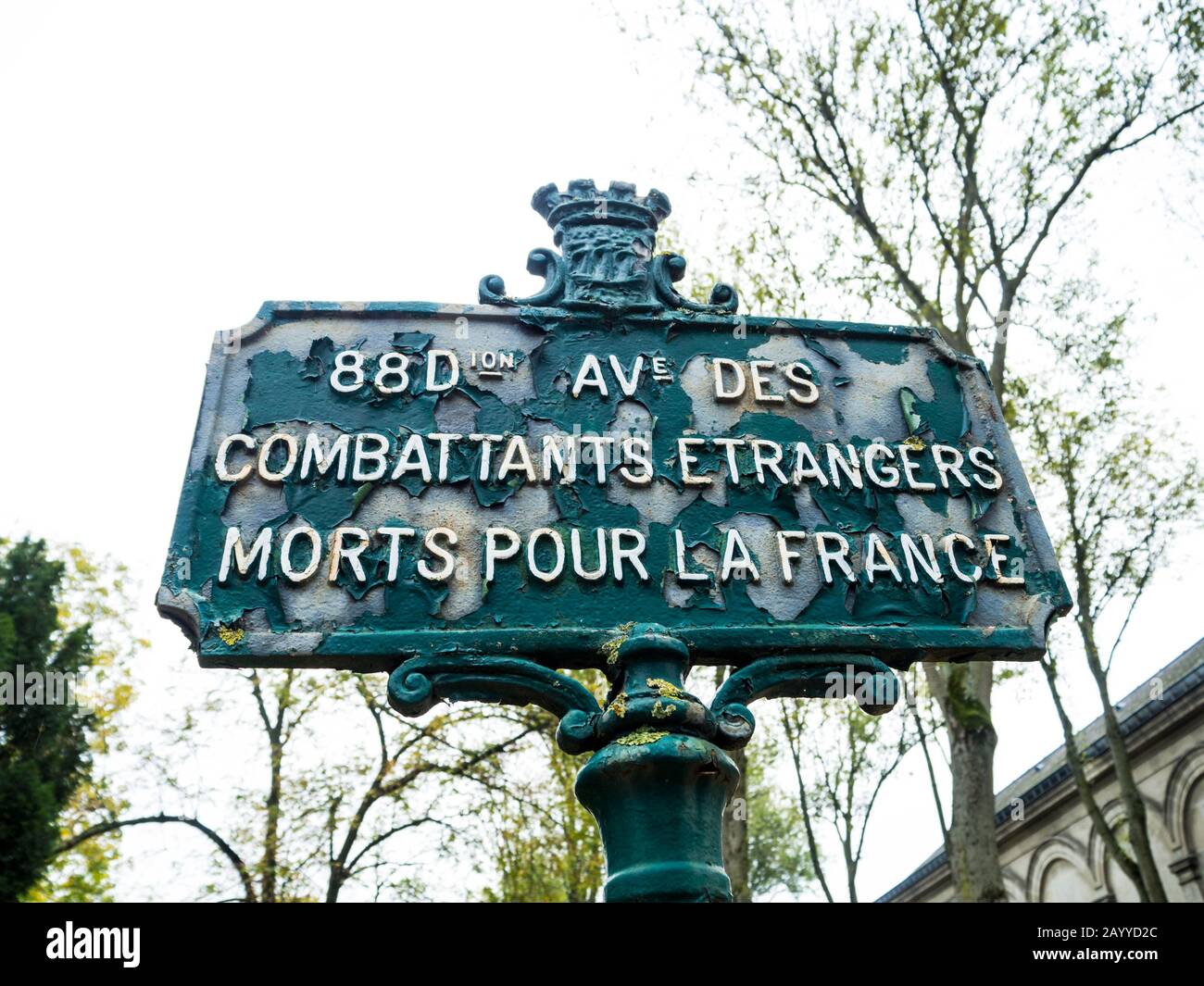 Old green signal with name of the boulevards written in French with ...