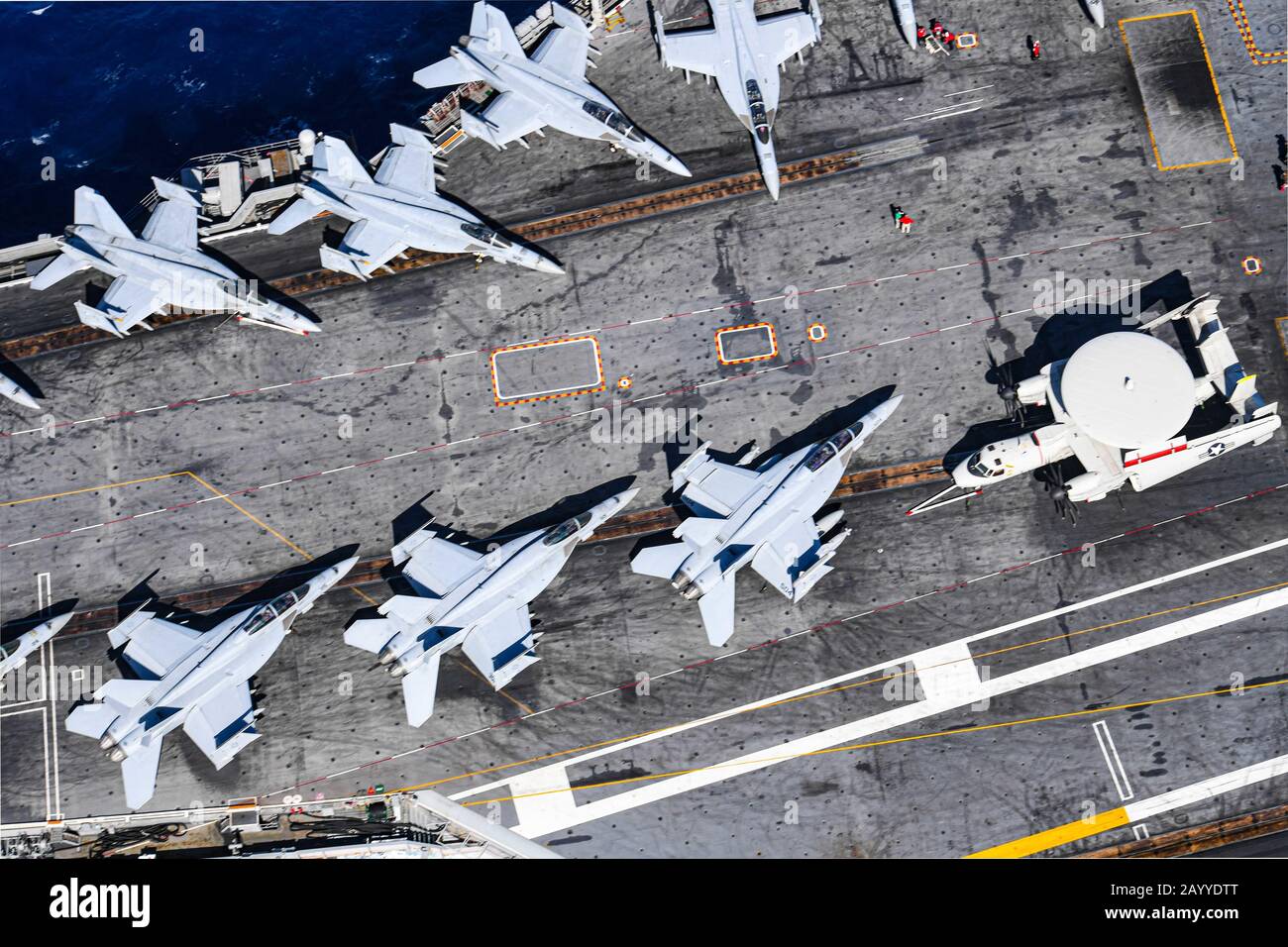 Aircraft line the deck of the U.S. Navy Nimitz-class nuclear powered aircraft carrier USS ...