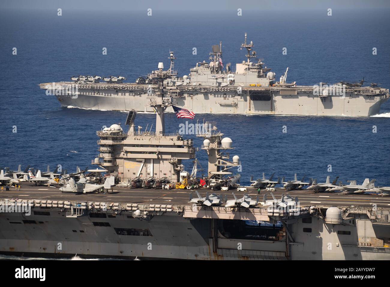The U.S. Navy Nimitz-class nuclear powered aircraft carrier USS Theodore Roosevelt and the ...