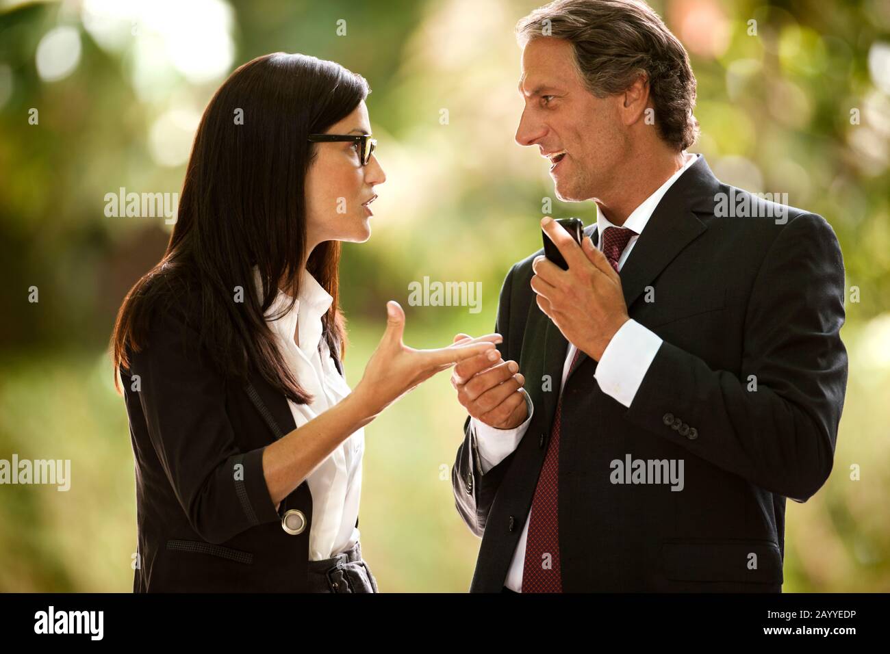 Professional couple arguing Stock Photo - Alamy
