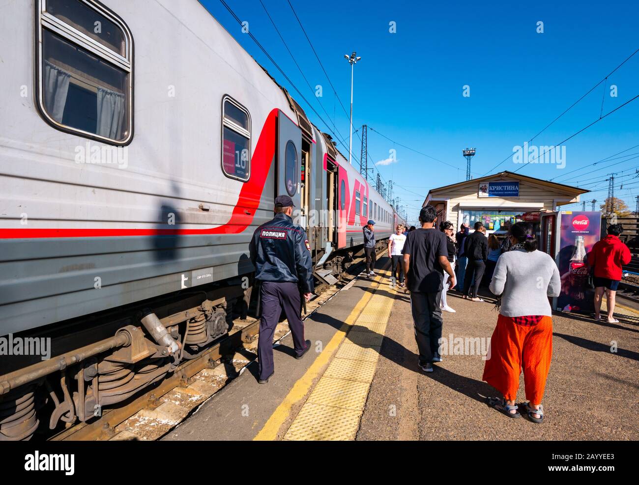 Passengers at Marlinsk railway station & Trans-Siberian Express train ...