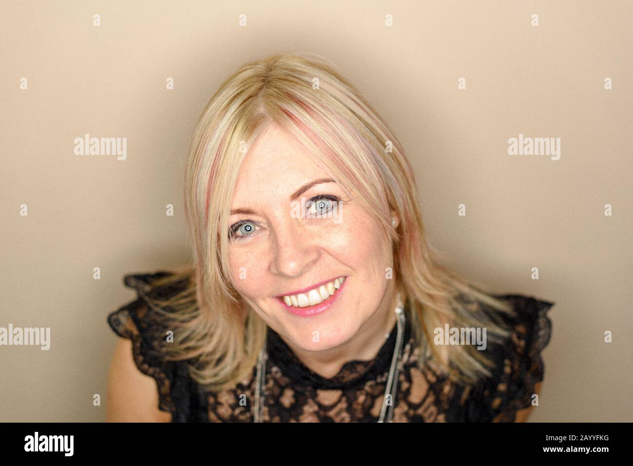 Uk, Leicestershire - Jan 2017 - Caucasian woman mid 40's with pink dye ...